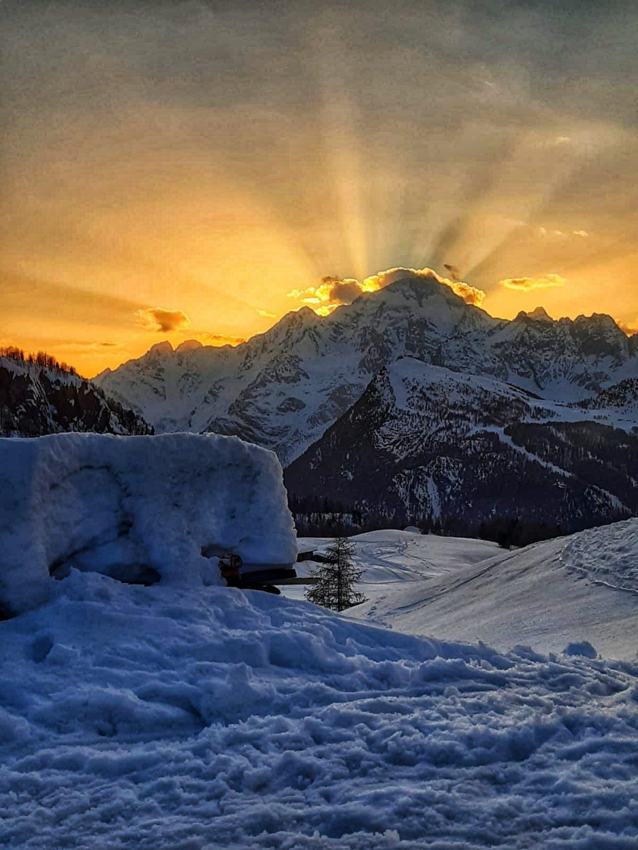 Ciaspolata al tramonto sotto il Pizzo Scalino | Freedome